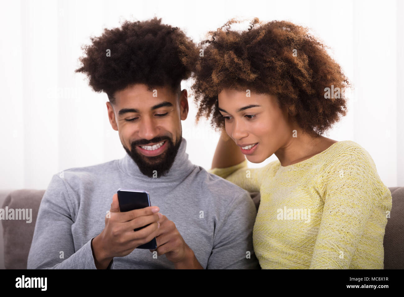 Happy looking phone close up hi-res stock photography and images - Alamy