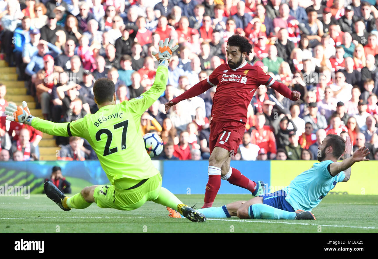 Liverpool's Mohamed Salah sees his shot on goal go wide during the ...