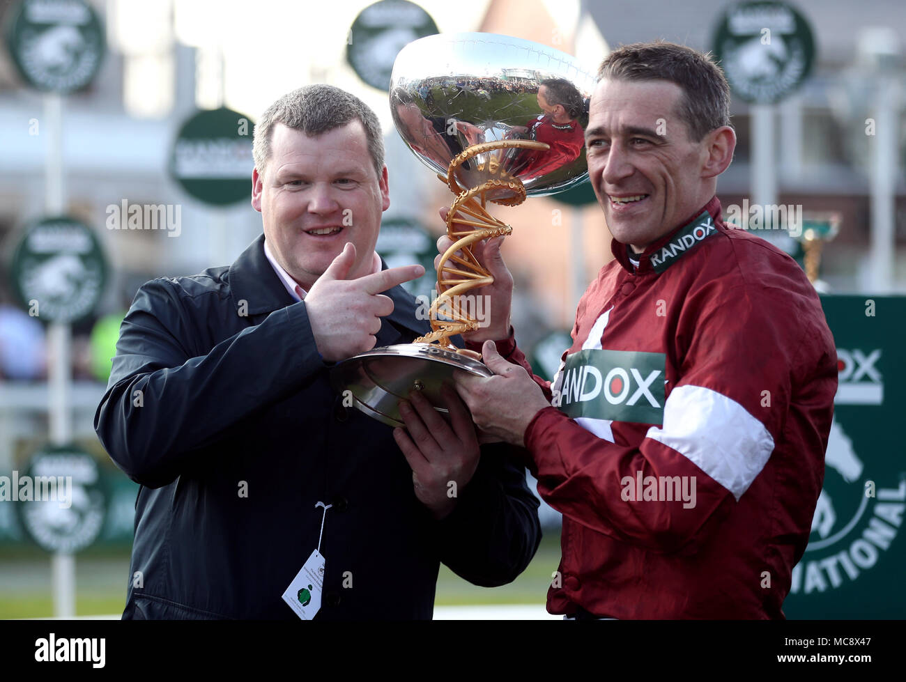 Winning Jockey Davy Russell and trainer Gordon Elliott (left) after ...