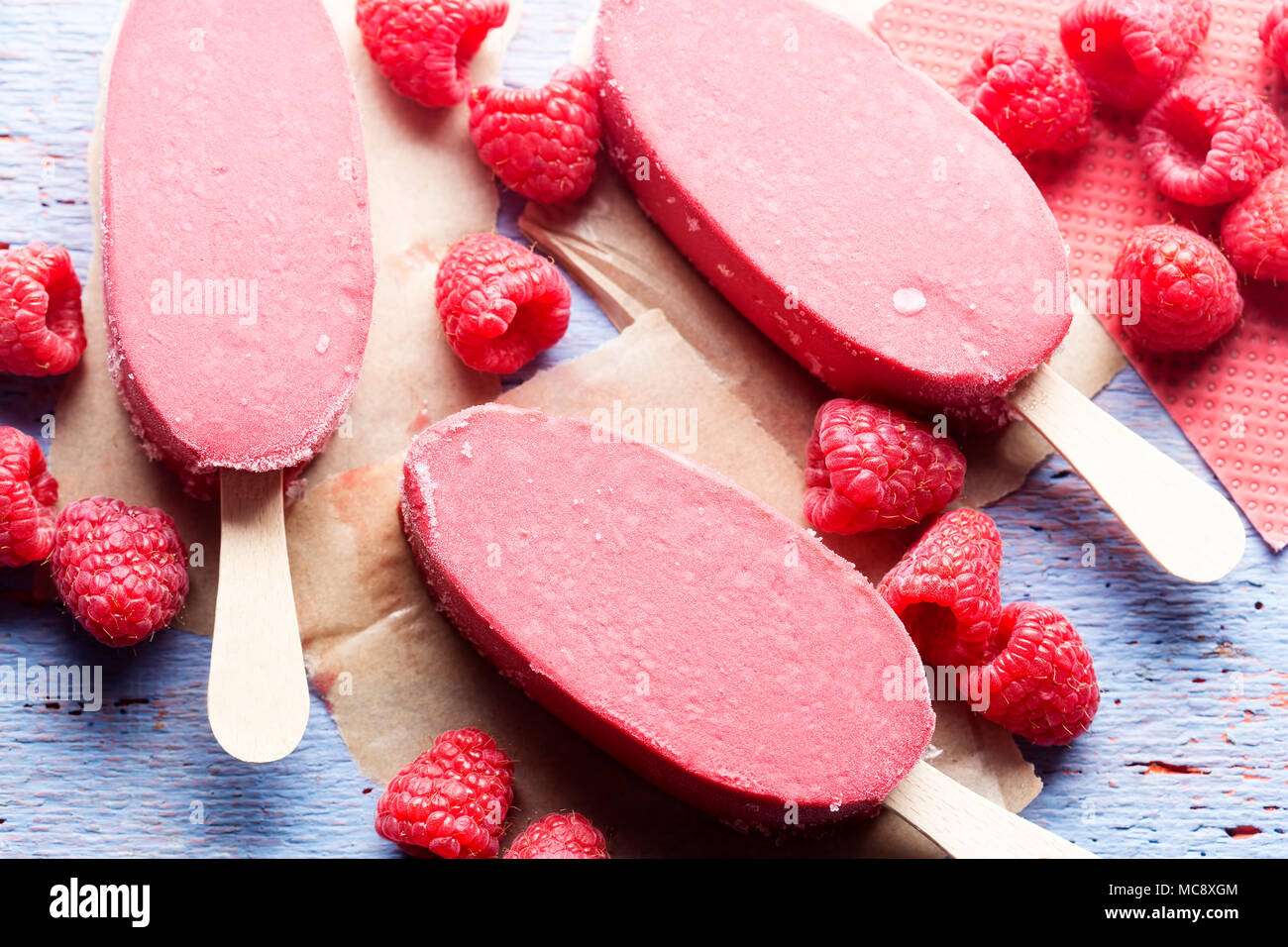 Raspberry smoothie popsicles Stock Photo - Alamy