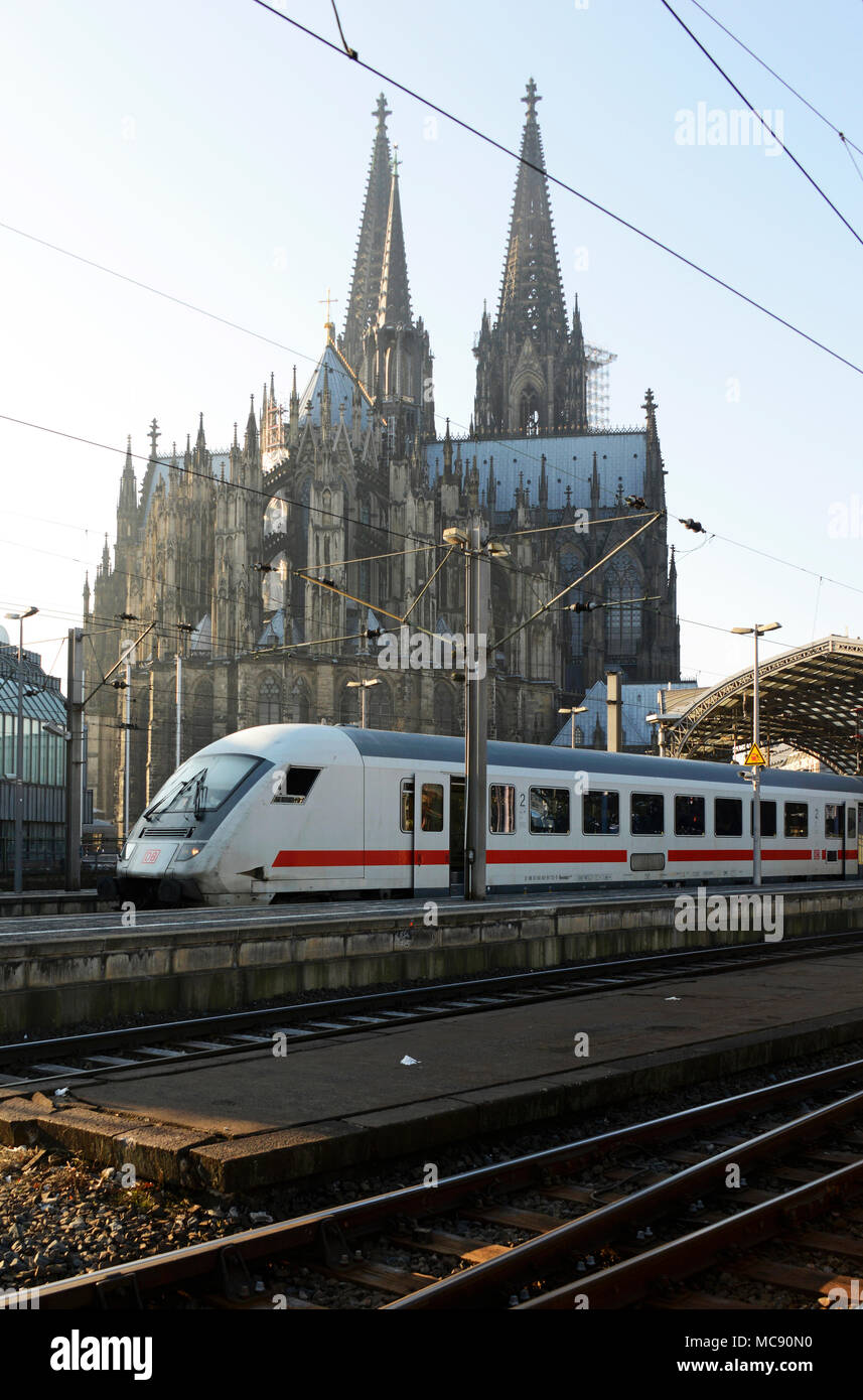 EMU electric train at Cologne station in Germany, with the cathedral ...