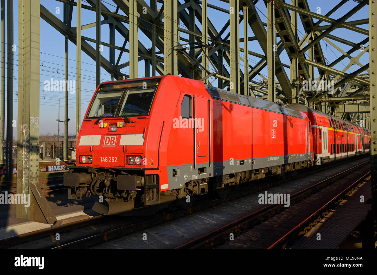 A passenger service hauled by a class 146 locomotive crosses the Rhine ...