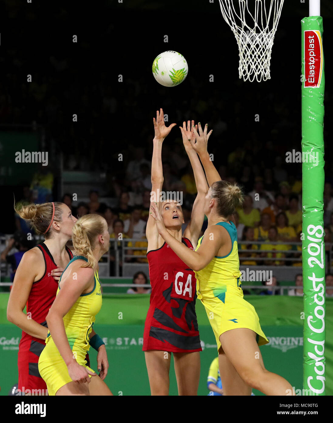 England's Helen Housby (second right) takes a shot against Australia in ...