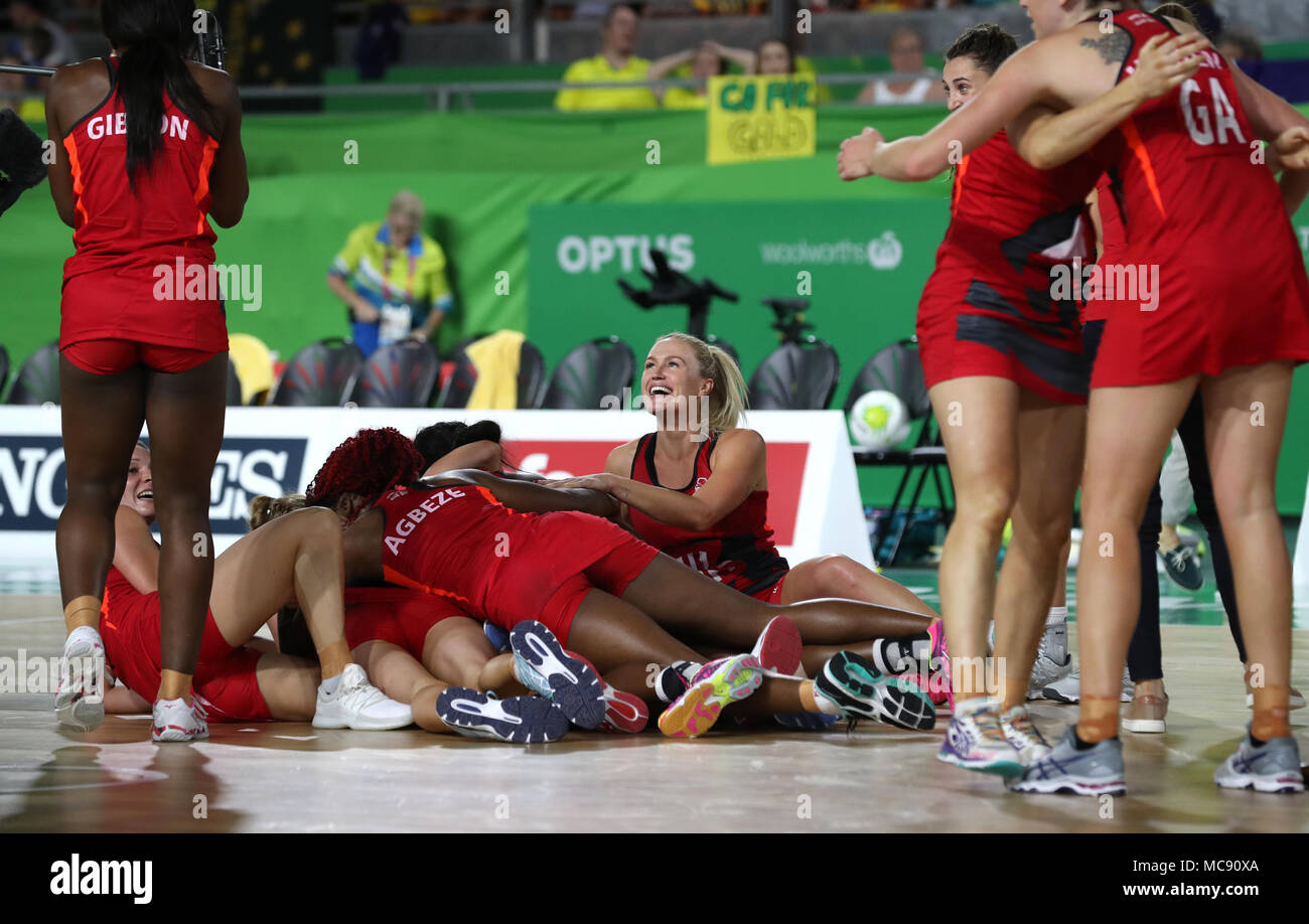 England players celebrate winning gold in the Women's Netball at the ...
