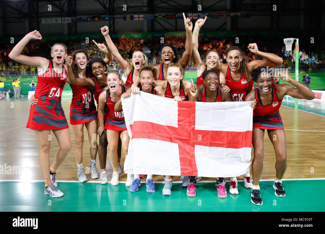 The England netball team celebrate winning gold in the Women's Netball ...