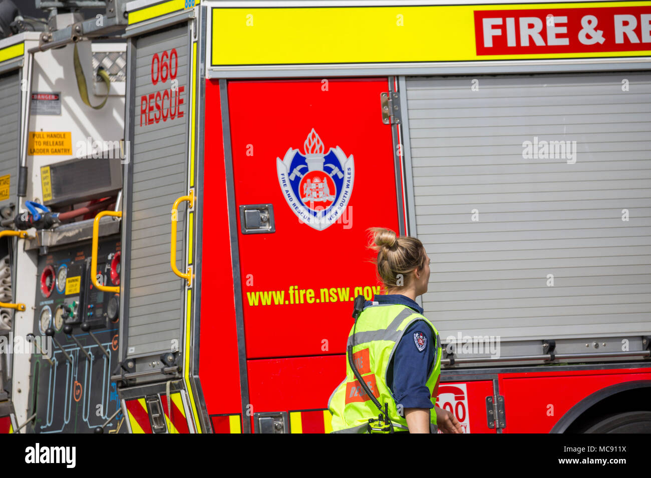 NSW female fire woman beside fire brigade truck in Sydney,Australia ...