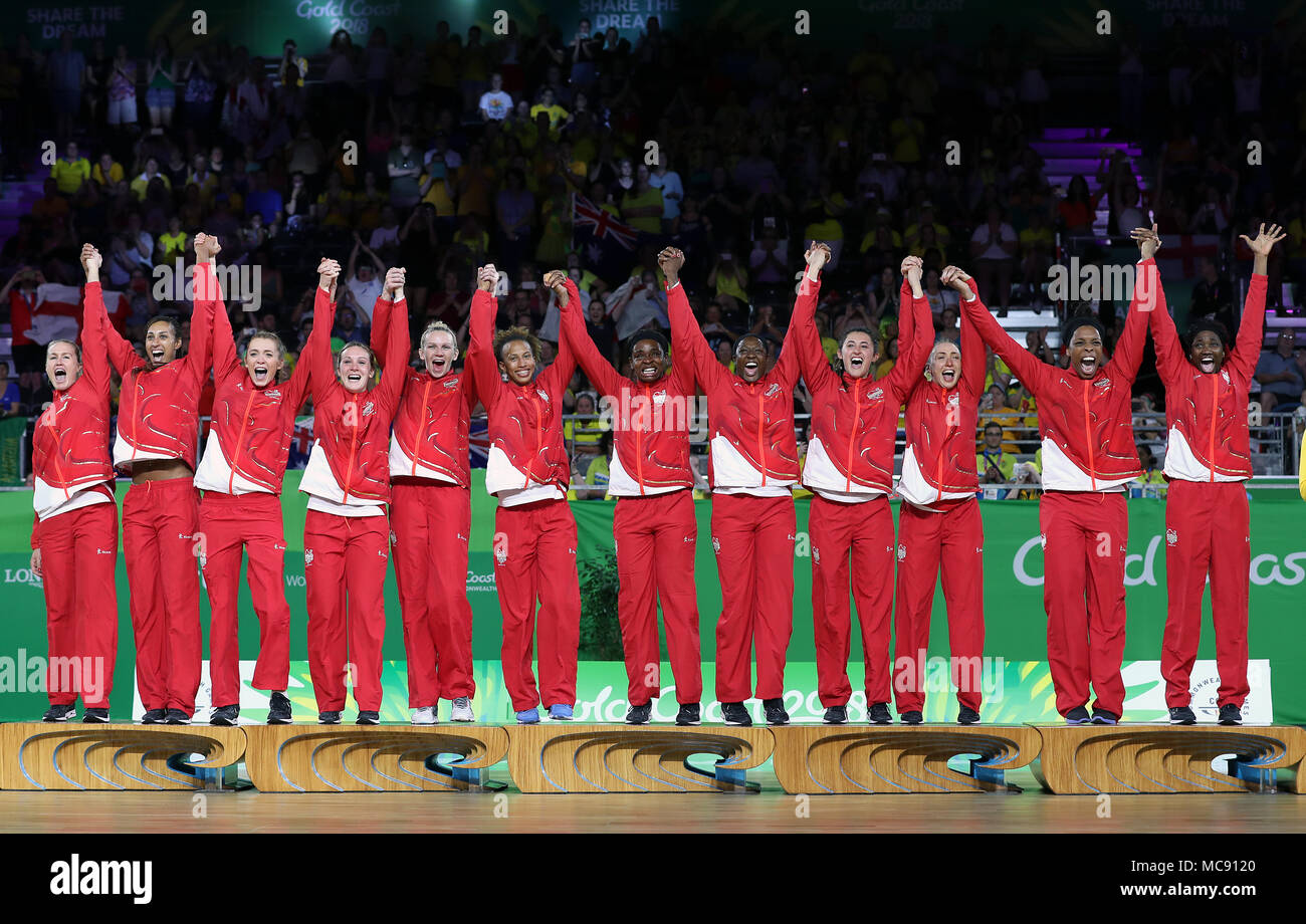 The England women's netball team celebrate with their gold medals at ...