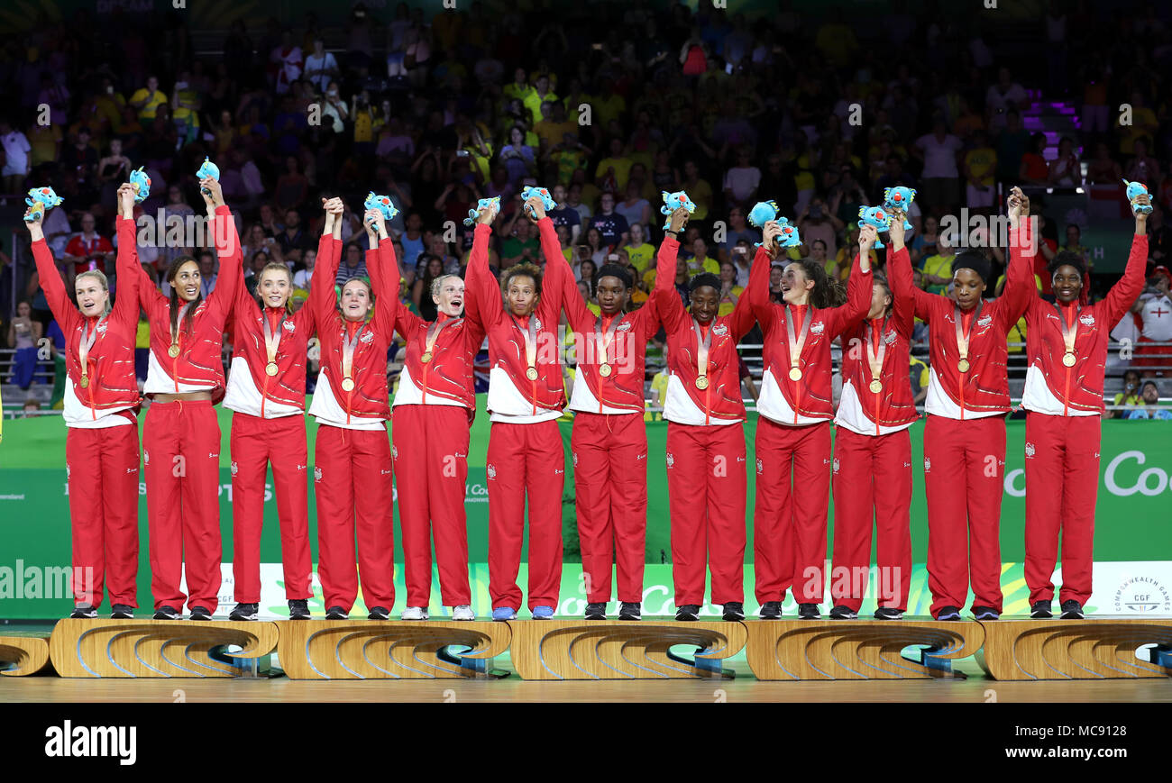The England women's netball team celebrate with their gold medals at ...