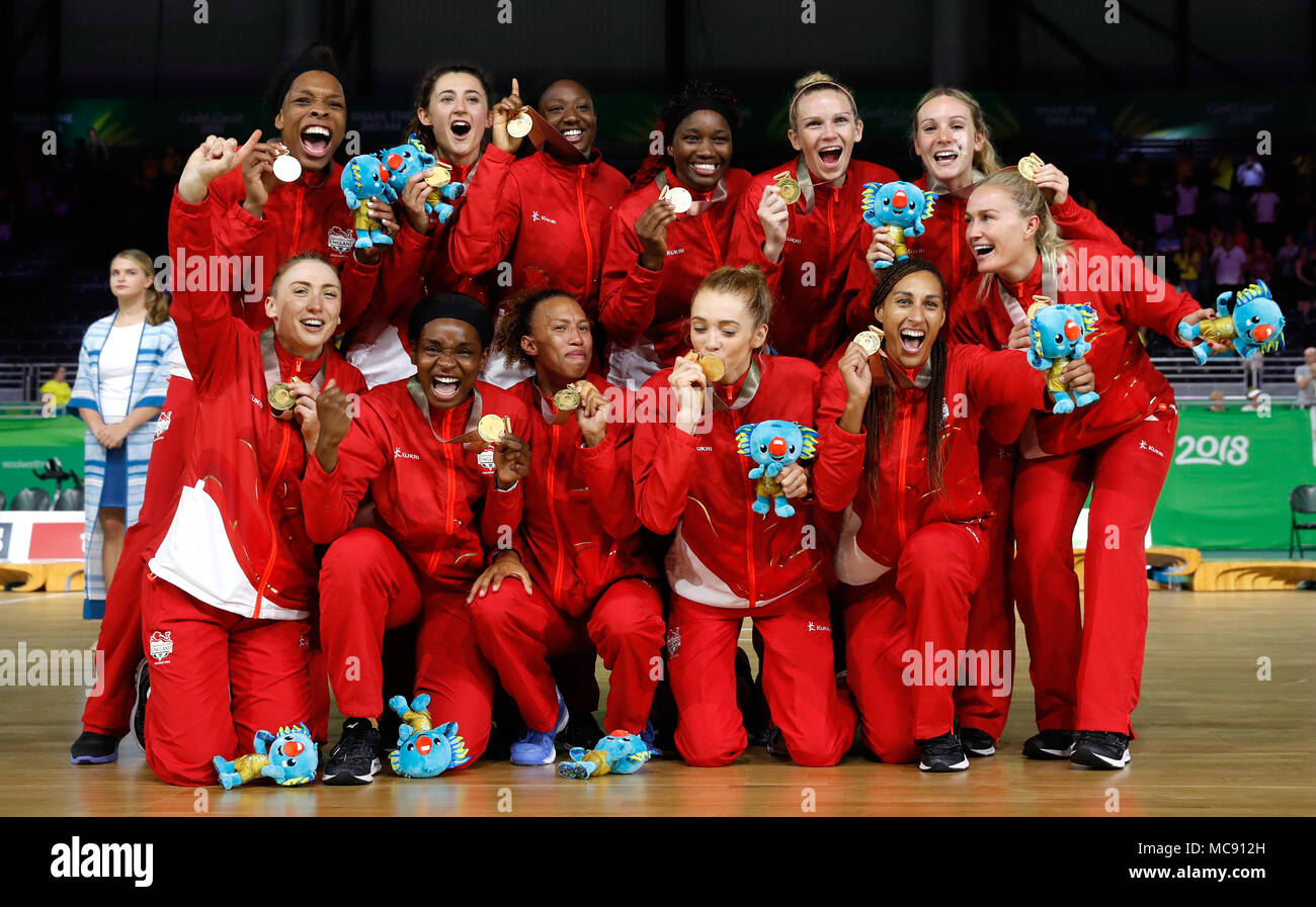 The England women's netball team celebrate with their gold medals at ...