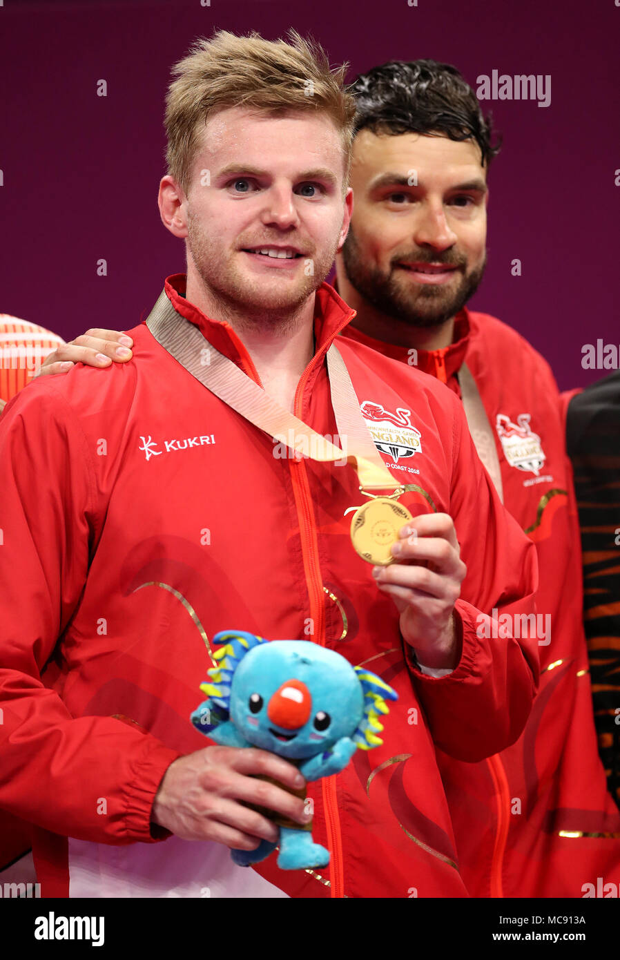 England's Marcus Ellis and Chris Langridge celebrate with their gold ...