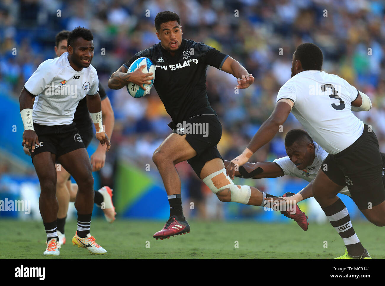 New Zealand's Regan Ware (centre) scores a try in the Men's Rugby ...