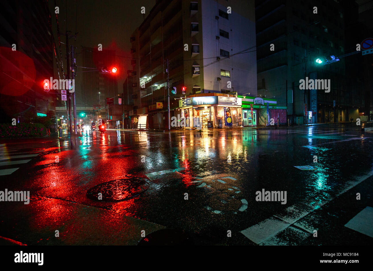 Osaka, Japan - April 14, 2018: A quiet intersection in heavy rain Stock ...