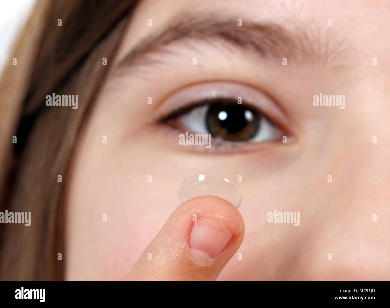 contact lens for vision and girl face closeup Stock Photo - Alamy