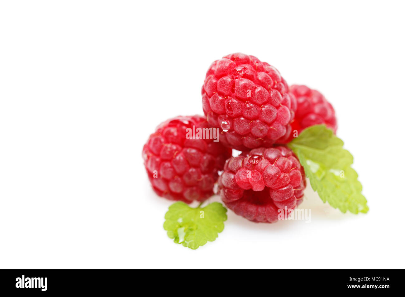 natural raspberry berries with mint leaf isolated on white background ...
