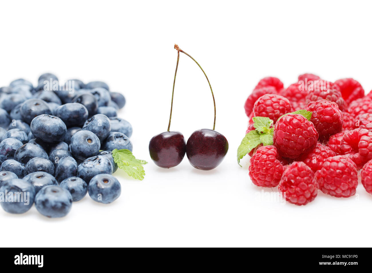 natural blueberry, cherry and raspberry berries isolated on white ...