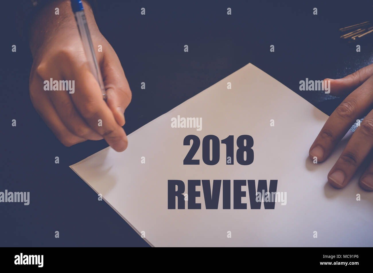 Review written hi-res stock photography and images - Alamy