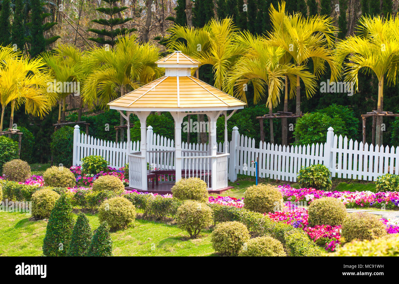 A beautiful pavilion in the flowers garden Stock Photo - Alamy