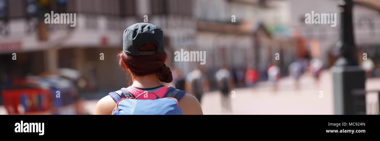 Photo of woman from back on blurred background Stock Photo - Alamy
