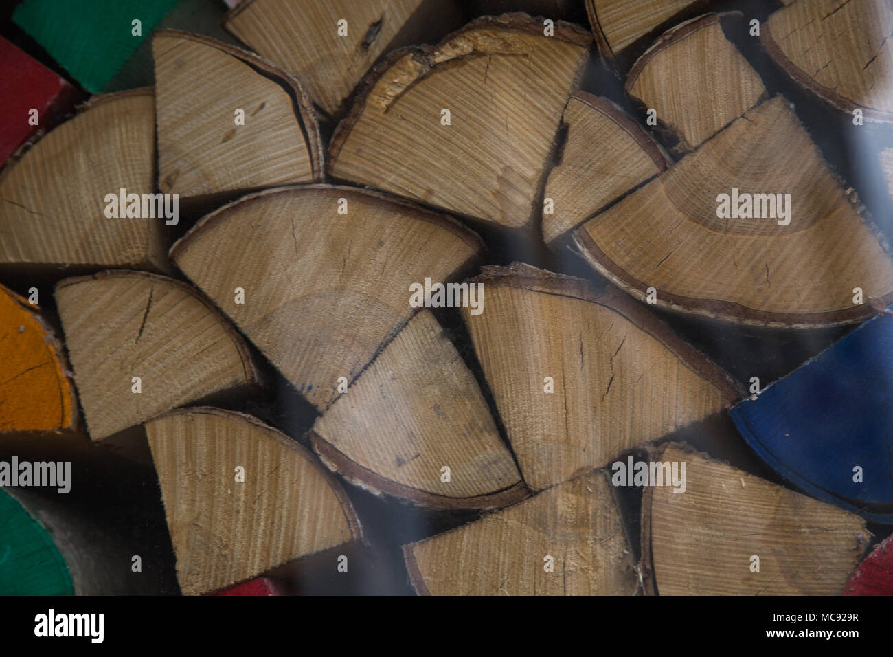 Triangular colored wood pieces backdrop abstract Stock Photo - Alamy