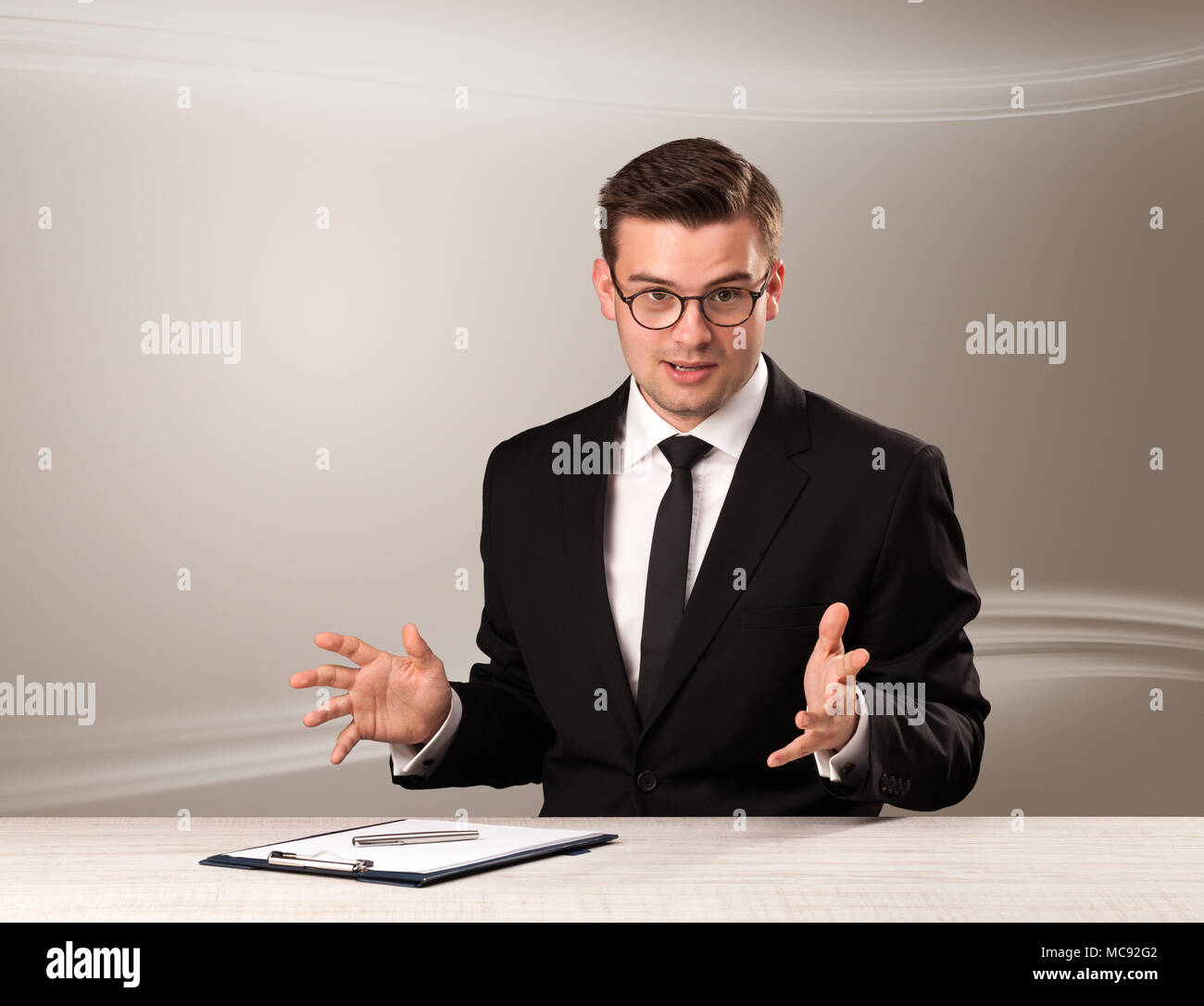 Televison presenter host in live show with blank background Stock Photo ...