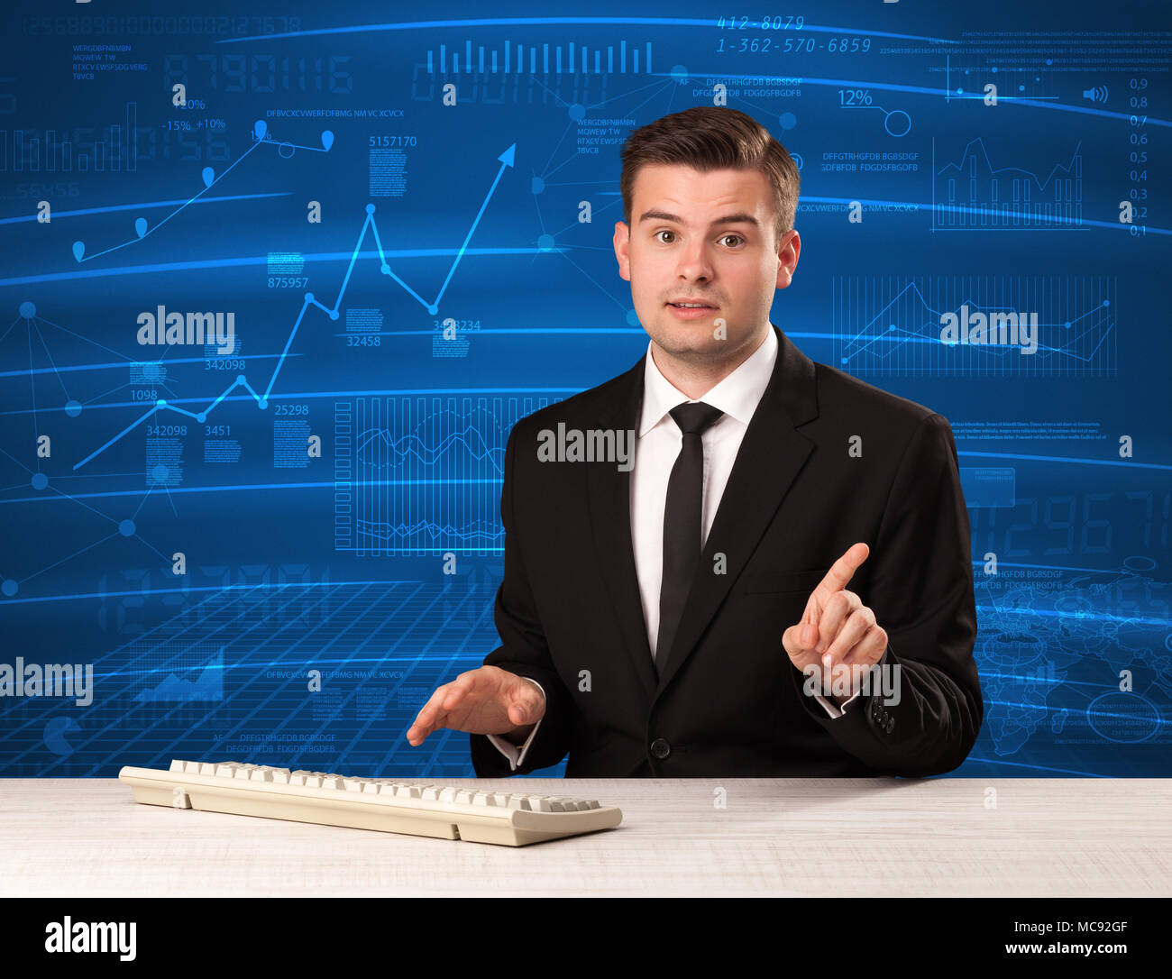 Stock data analyst in studio giving adivce on blue chart background ...