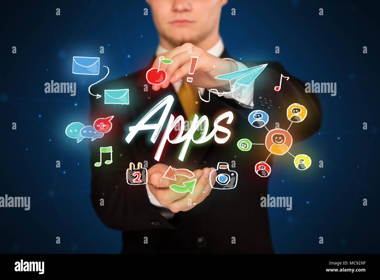 Businessman with drawn application icons and symbols in his hands Stock ...