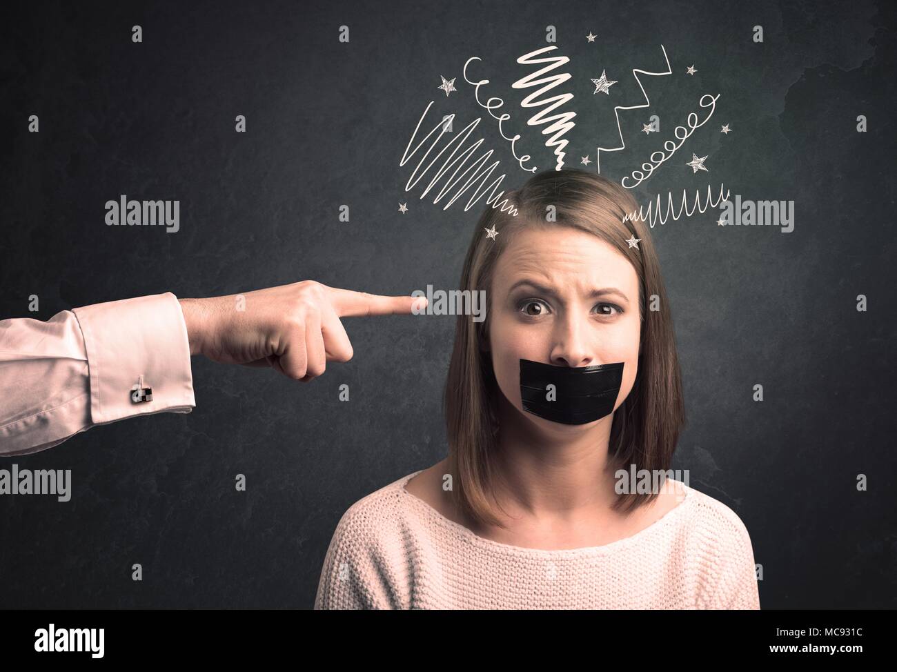 Caucasian hand pointing at scared female employee Stock Photo - Alamy