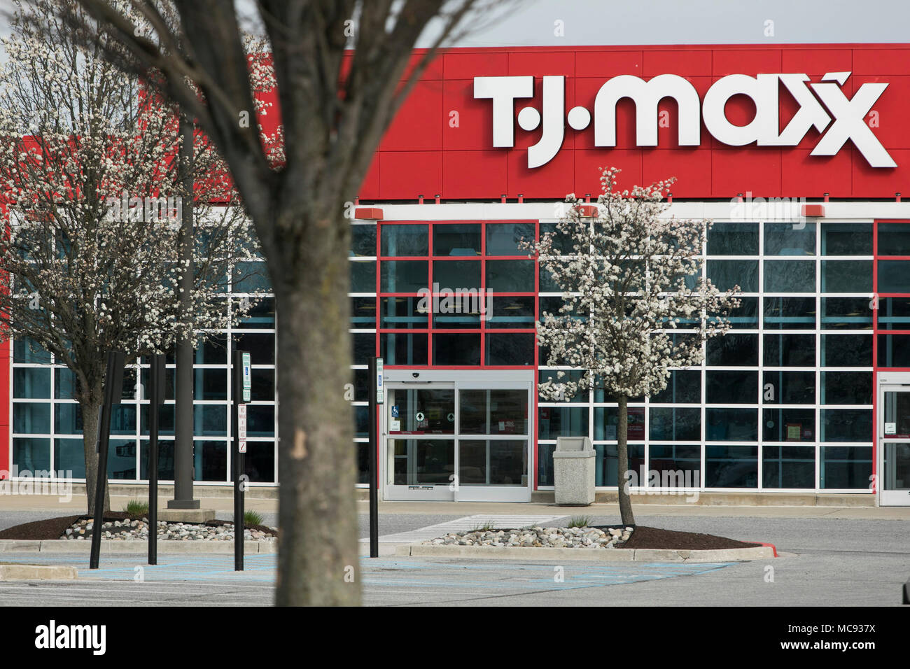 A logo sign outside of a TJ Maxx retail store in Columbia, Maryland on ...