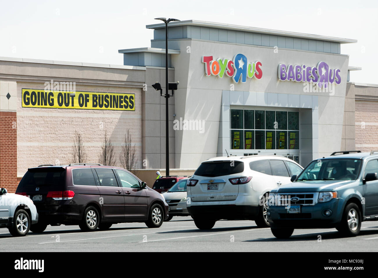 A logo sign outside of a joint Toys "R" Us and Babies "R" Us retail ...