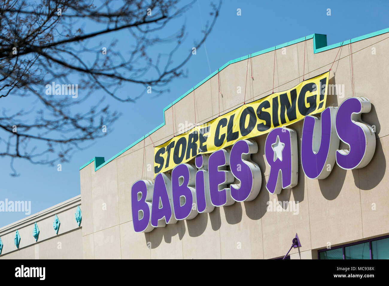 A logo sign outside of a Babies "R" Us retail store in Silver Spring ...
