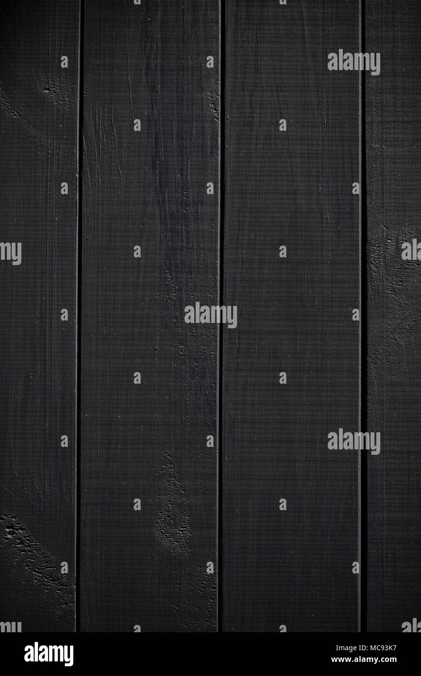 Wood texture. black timber board with weathered crack lines. Natural ...