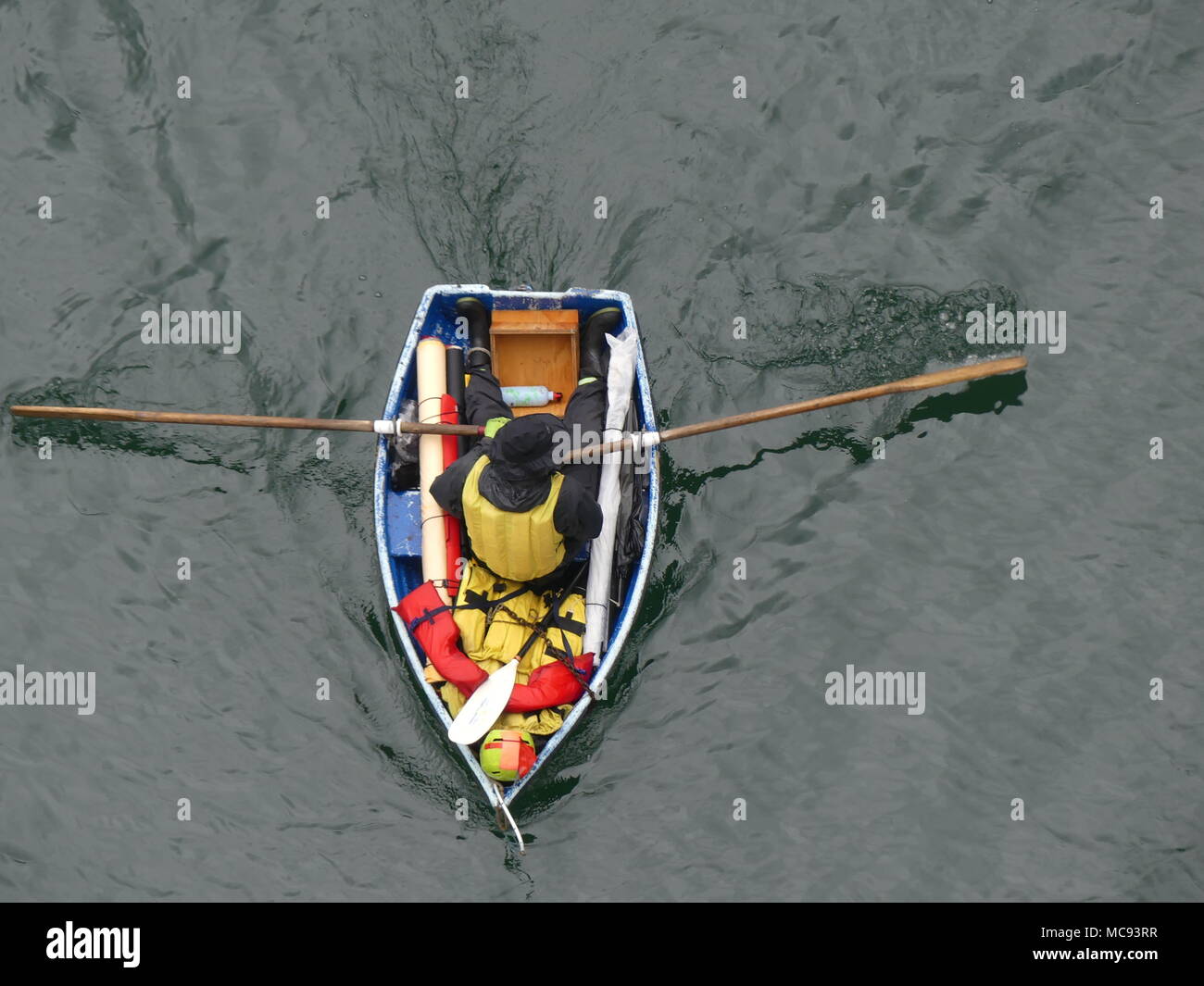 Rowboat top view male ocean Stock Photo - Alamy