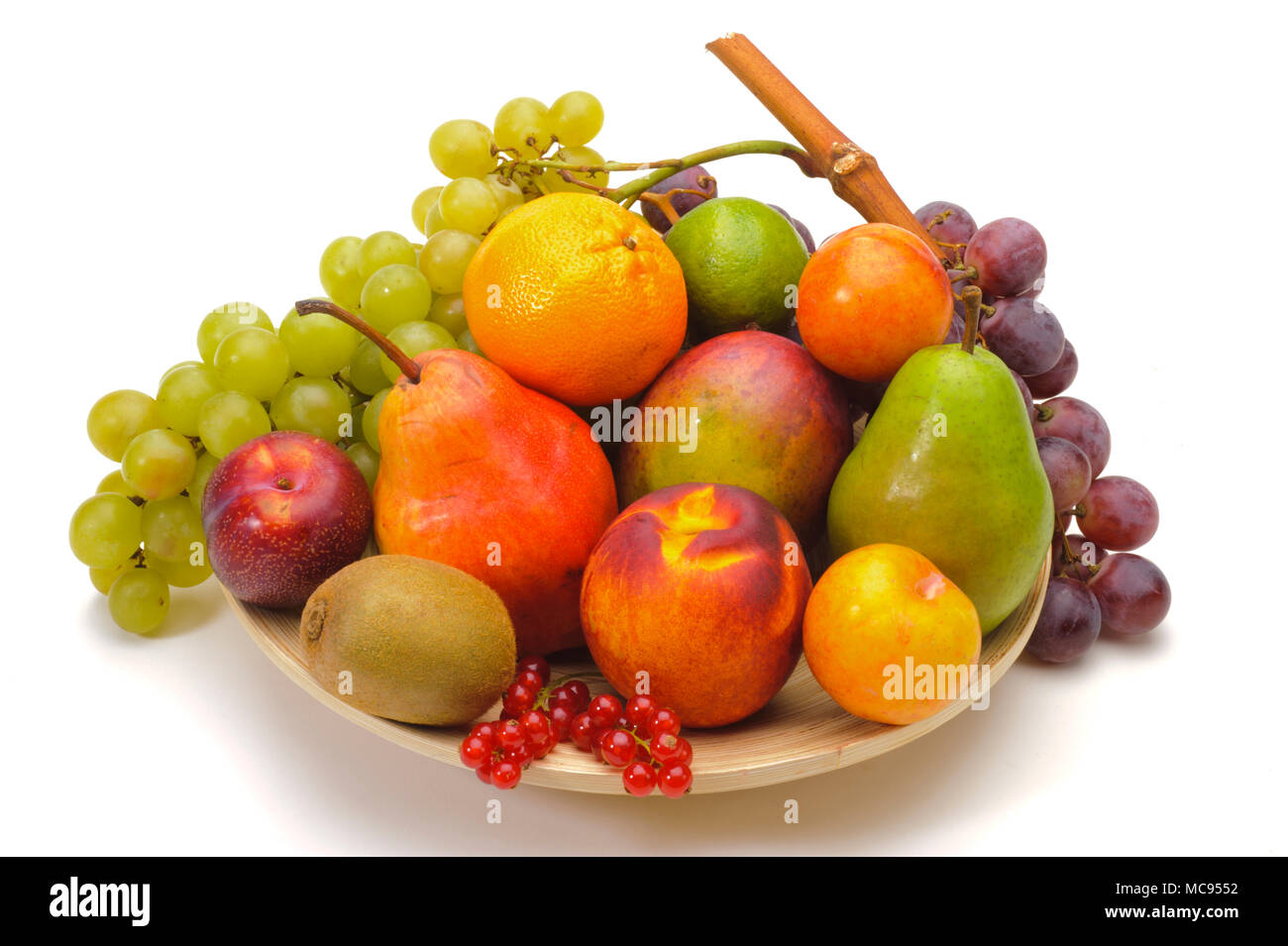 arrangement of fresh fruits from market and isolated over white ...