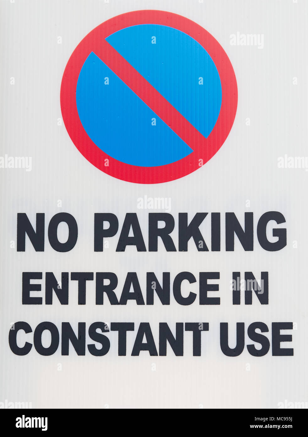 No parking Entrance in constant use 24 hour access required sign. Thank ...