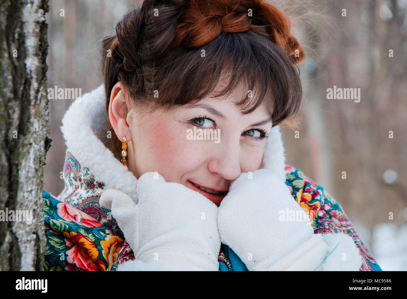 portreit of girl with beautiful hair on her head in Russian folk style ...