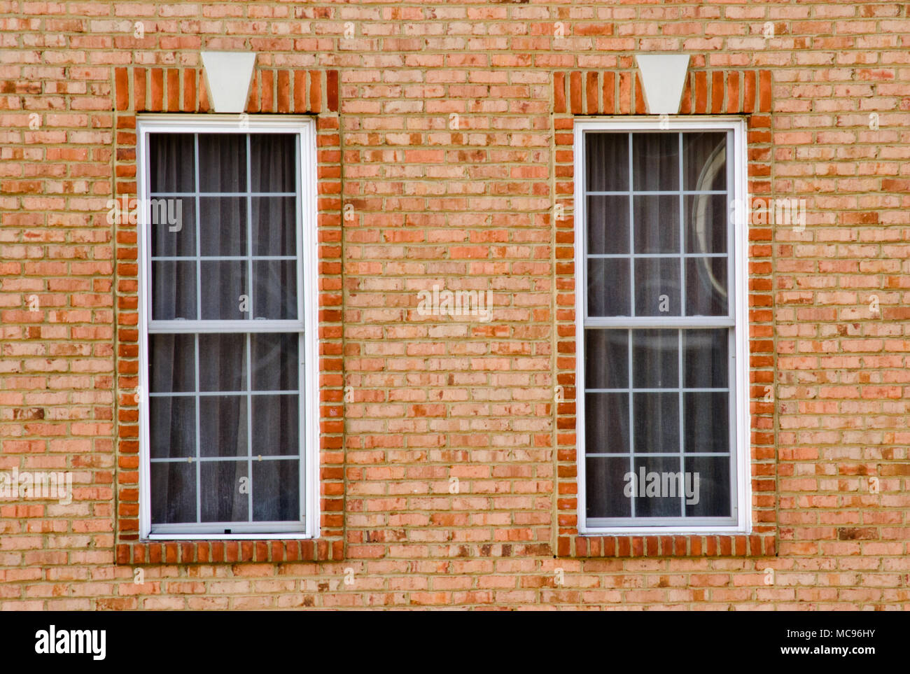 two adjacent windows Stock Photo - Alamy