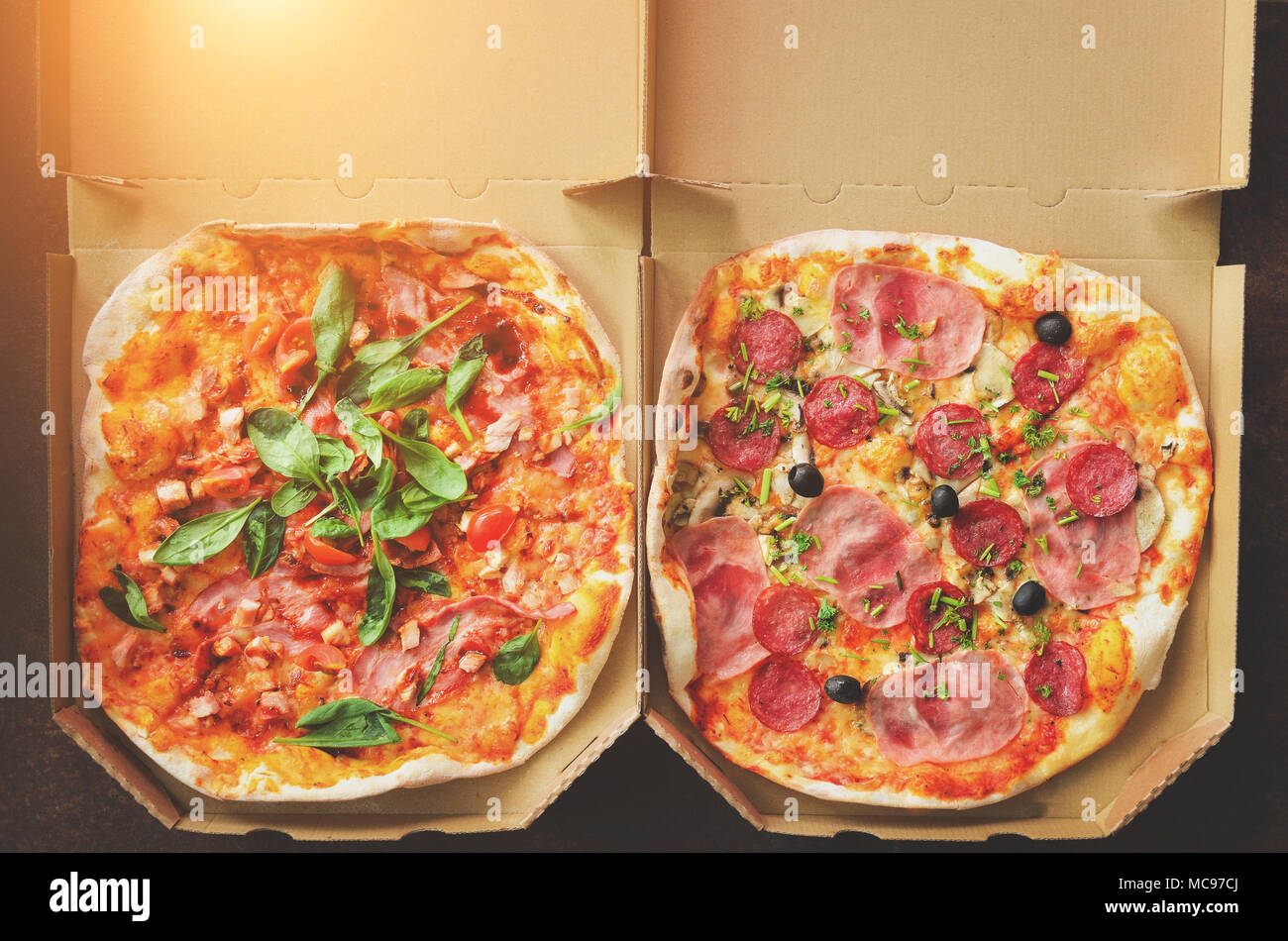 Homemade pizza. Top view with copy space on dark stone table. Sunny ...