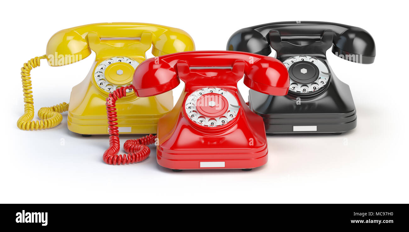 Group of vintage telephones of differents colors isolated on white ...