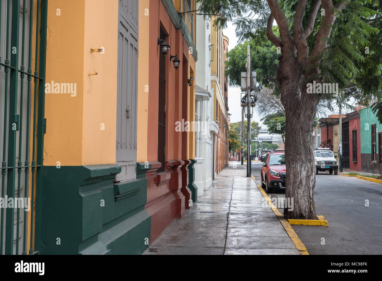 Lima, Peru -- April 13, 2018. A typically colorful side street in the ...