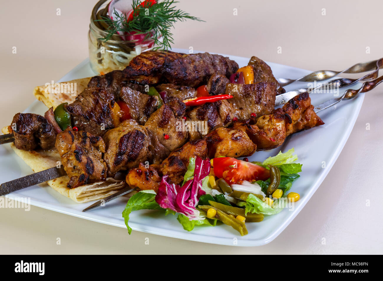 Barbeque meat mix plate with vegetalbes Stock Photo - Alamy
