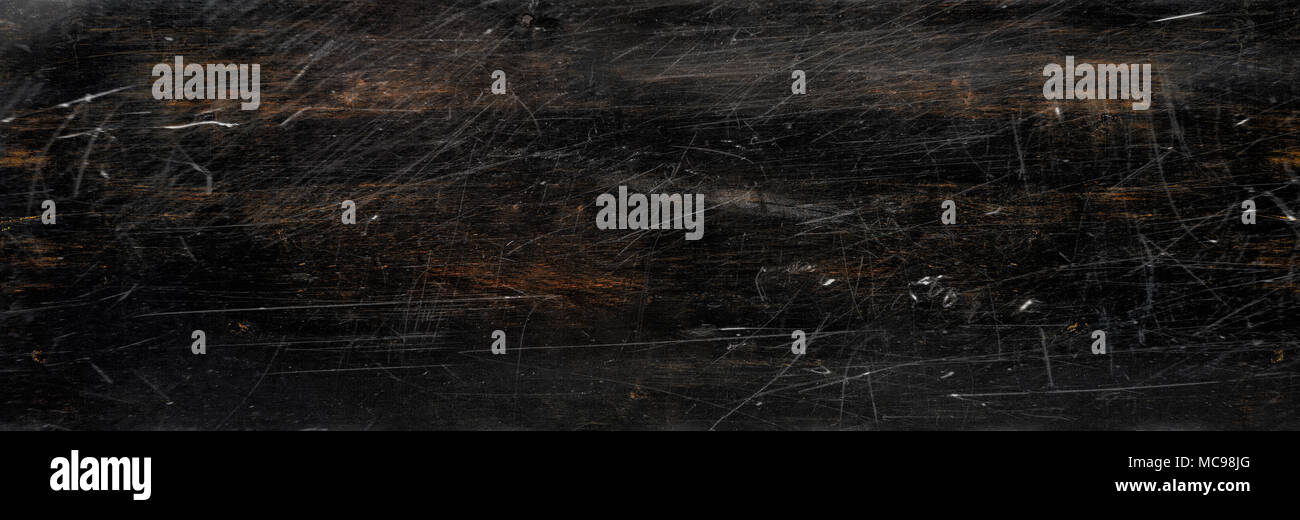 Dark brown scratched wooden texture, background with copy space. Banner ...