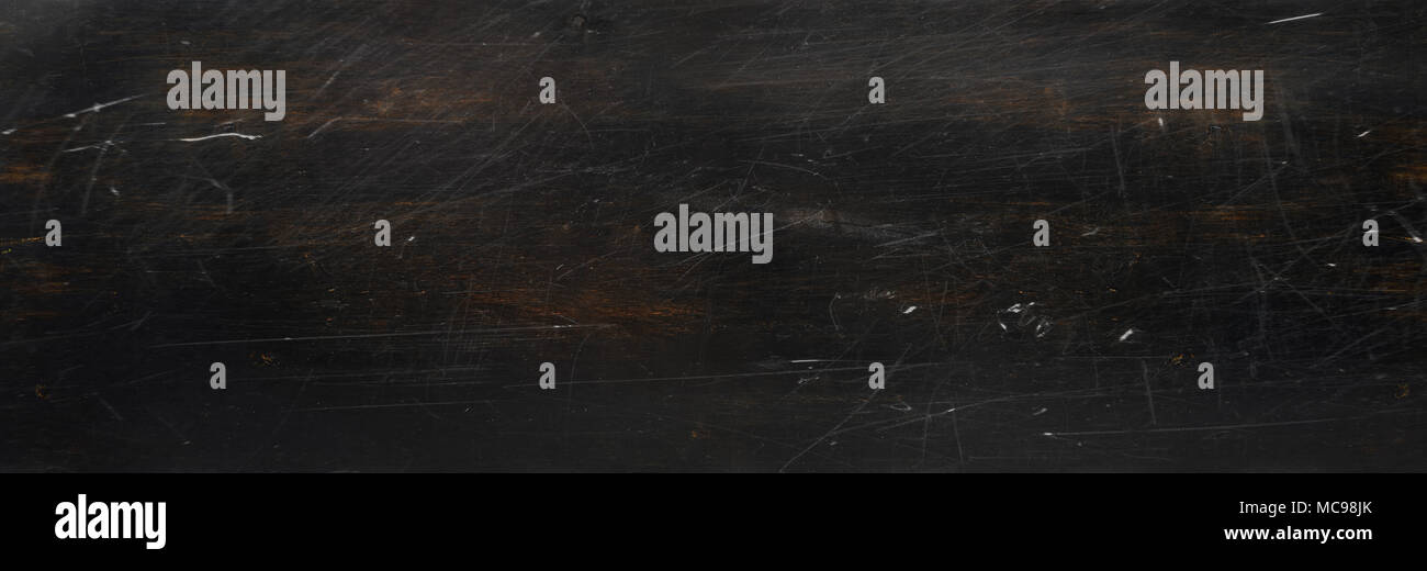 Dark brown scratched wooden texture, background with copy space. Banner ...