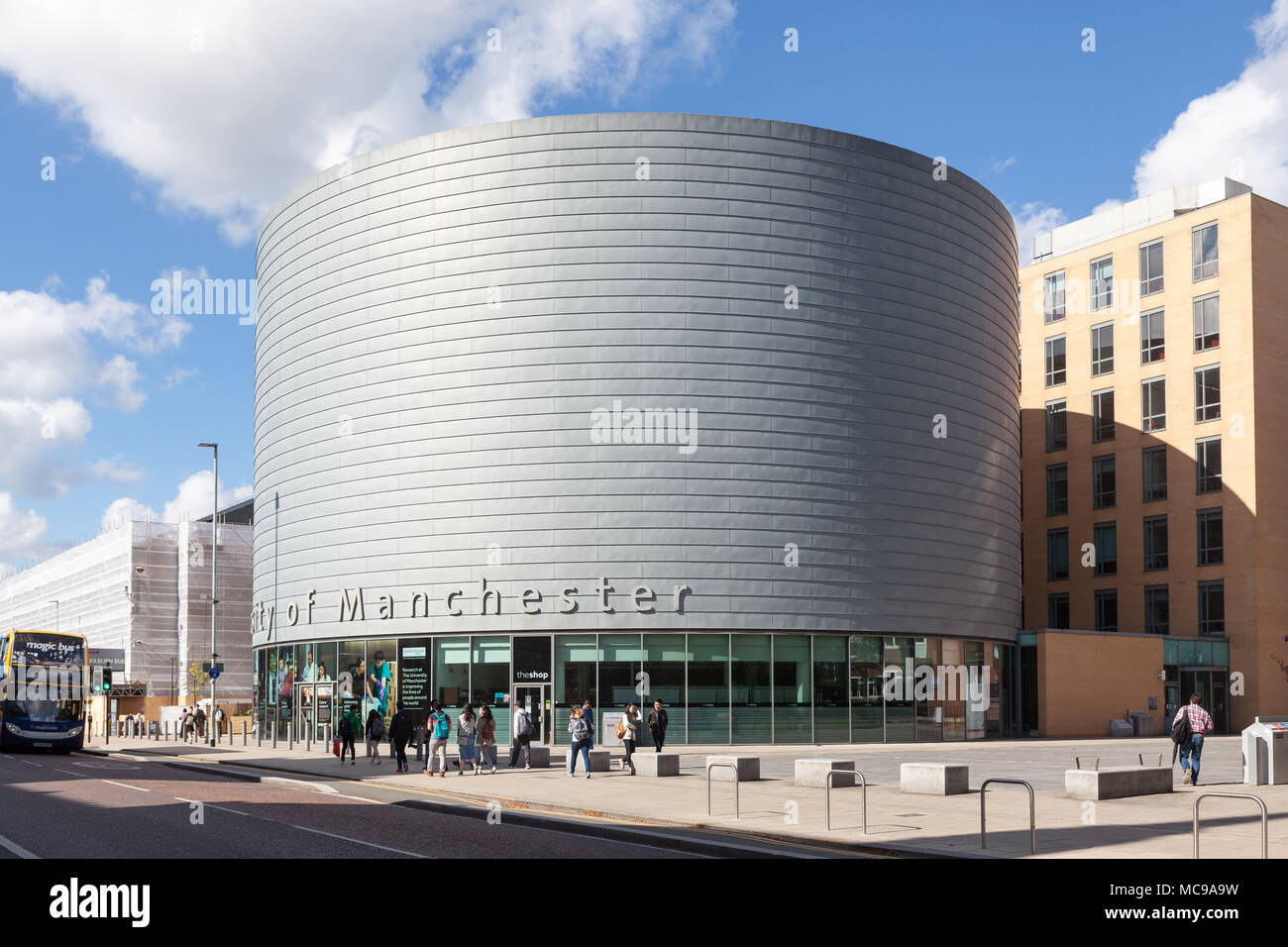 The large, drum-shaped building of The University of Manchester ...