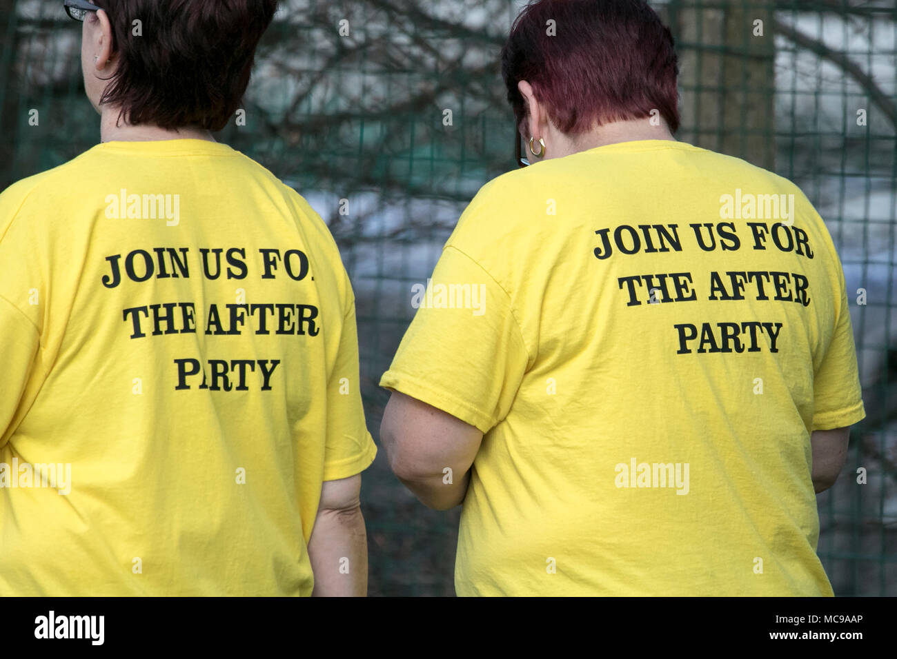 two women wearing t-shirts promoting an after party promotion at the ...