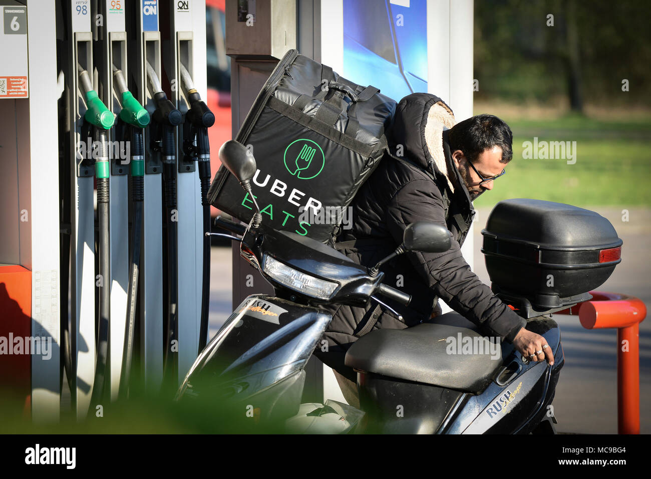 Uber eats scooter hi-res stock photography and images - Alamy