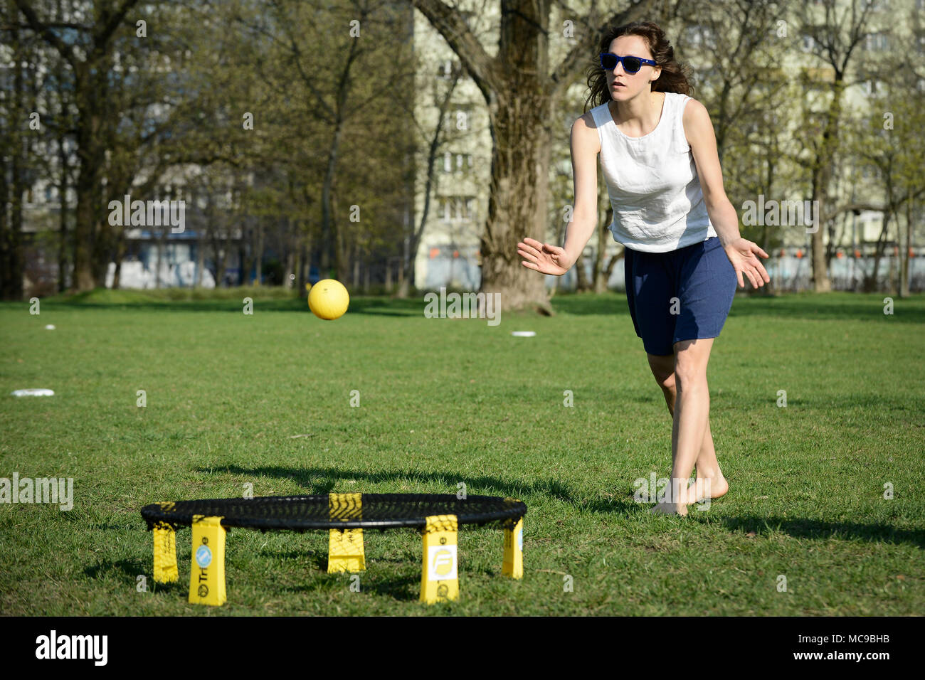 People are seen playing roundnet or spikeball as it is alos known in ...