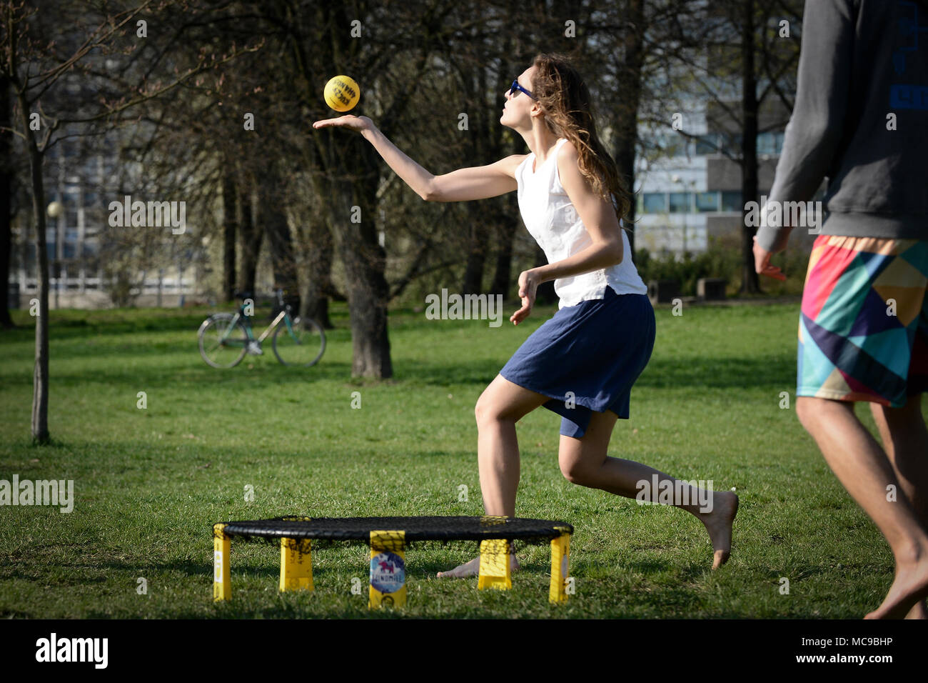 People are seen playing roundnet or spikeball as it is alos known in ...