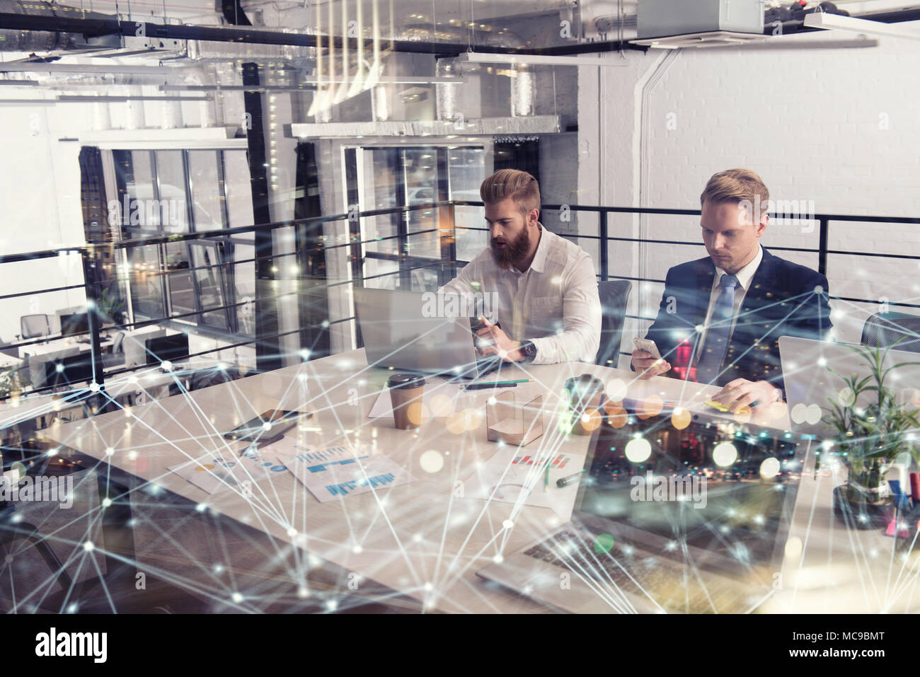Business people that work together in office at the night. Concept of ...
