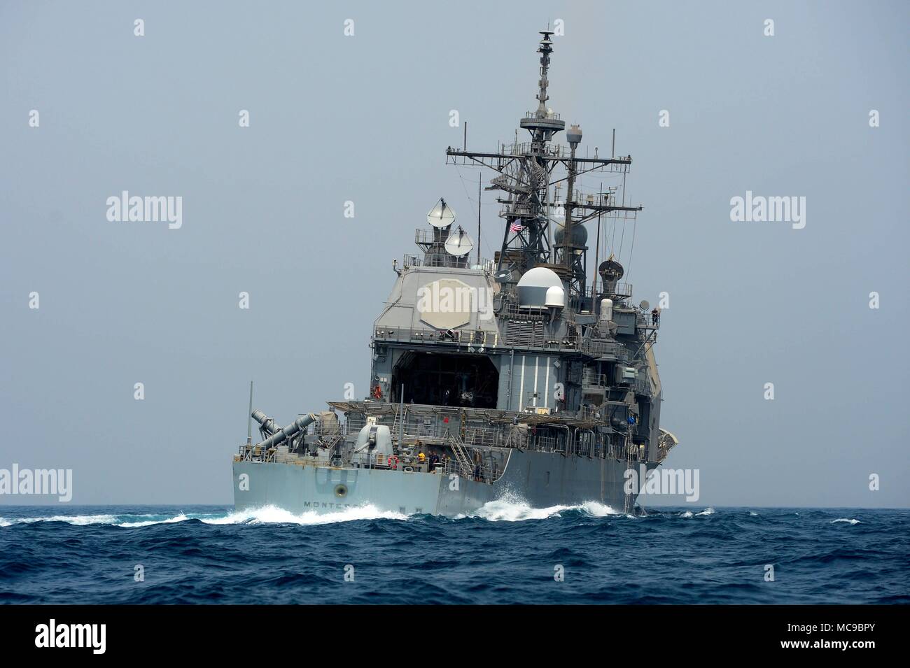 The U.S. Navy guided-missile cruiser USS Monterey (CG 61) performs high ...