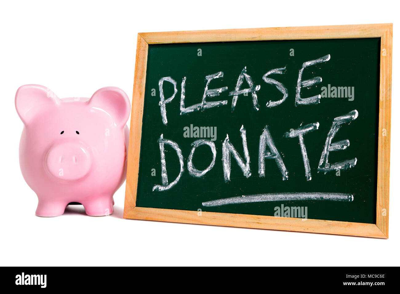 Charity donation box message, piggy bank with small blank blackboard ...